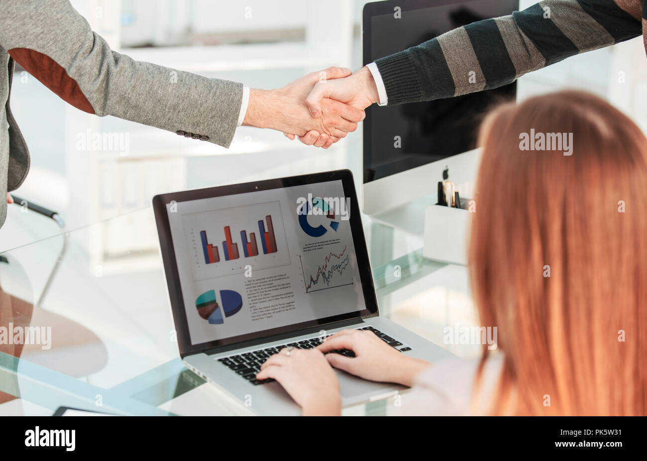 Handshake between manager client hi-res stock photography and images ...