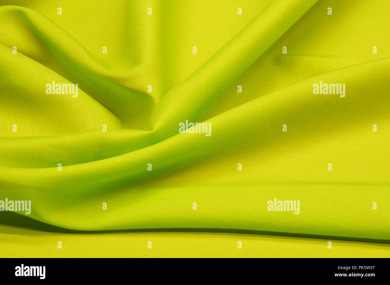 cotton fabric Batiste bright green color Stock Photo - Alamy