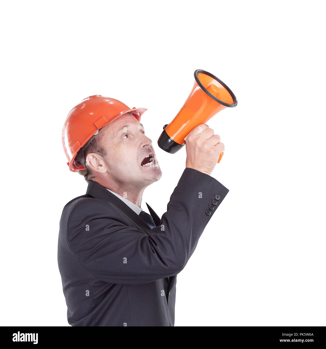 serious engineer with a screaming megaphone. photo with copy space ...