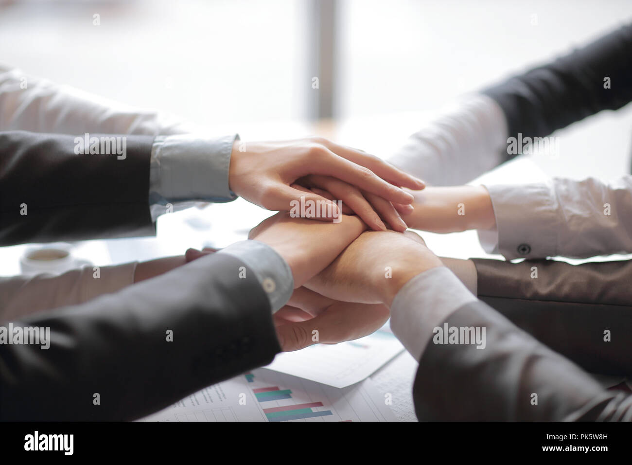 Close-up of people holding hands together. holding hands together Stock ...
