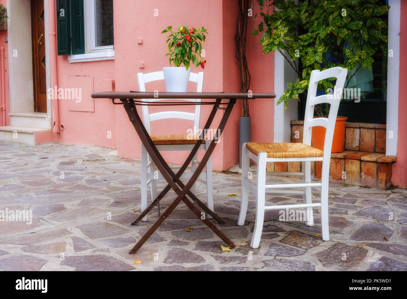 Street view of a Cafe terrace with empty tables and chairs,paris France ...