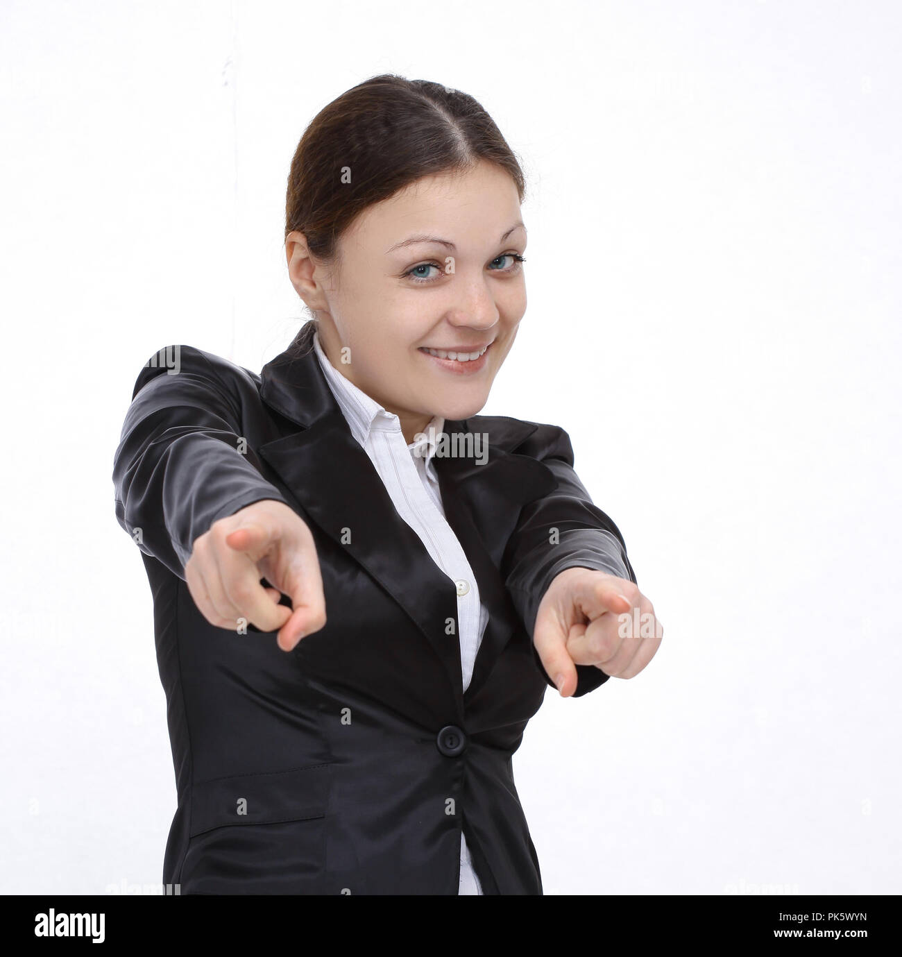 young woman employee pointing his arms forward Stock Photo - Alamy