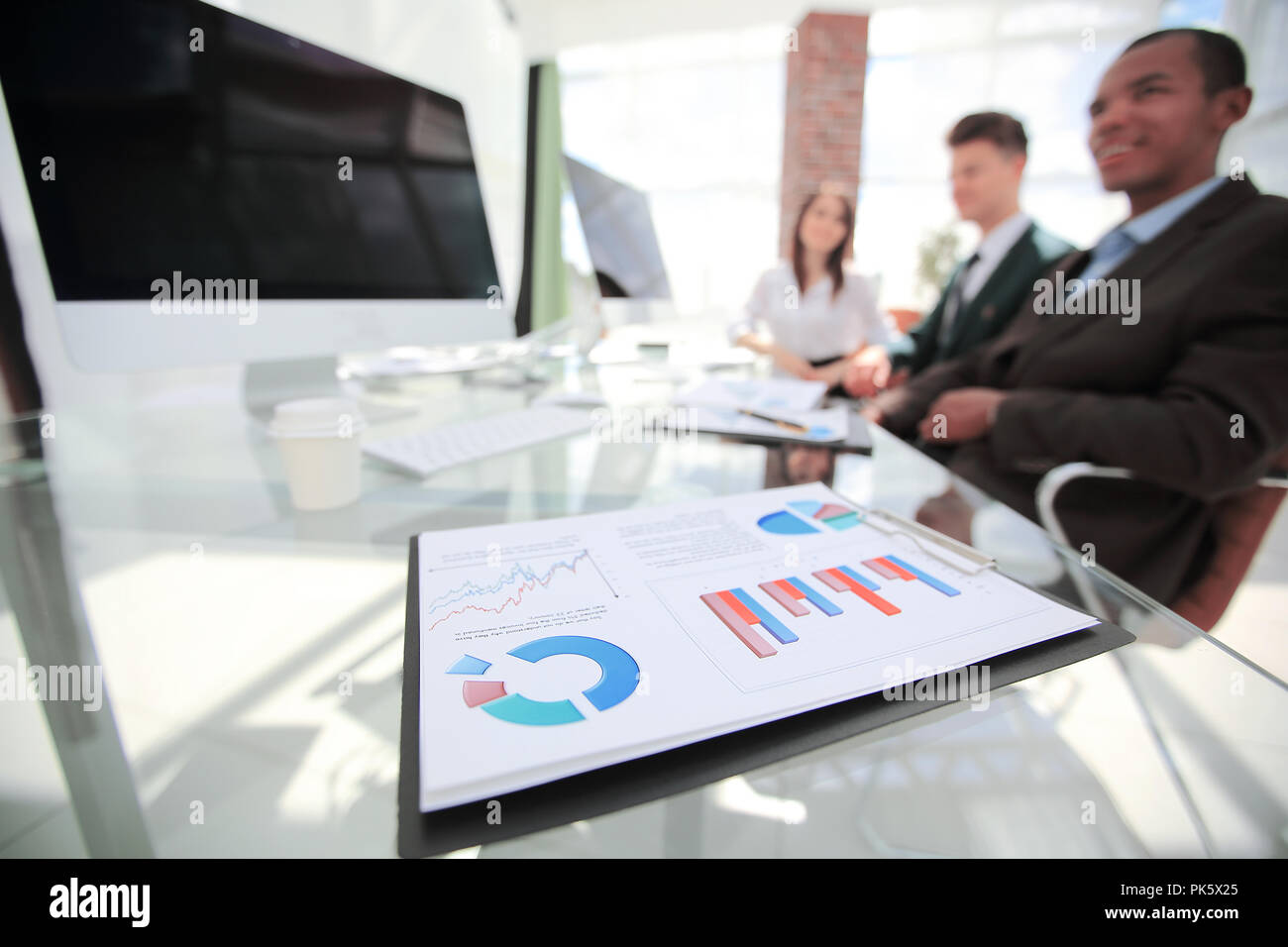 closeup.financial charts on the Desk of the business team Stock Photo ...