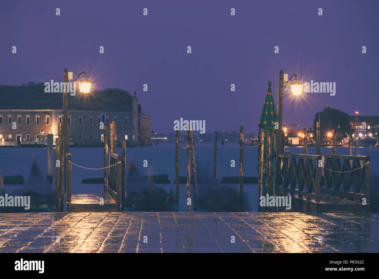 Venice classic lantern on seafront night view, Italy Stock Photo - Alamy