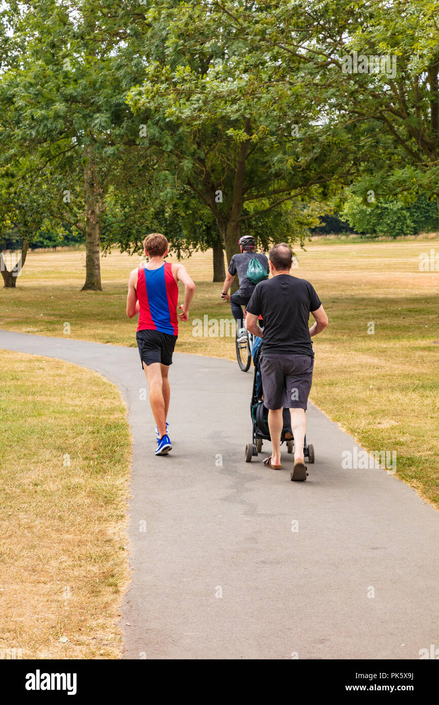 Exercise park cyclist runner hi-res stock photography and images - Alamy