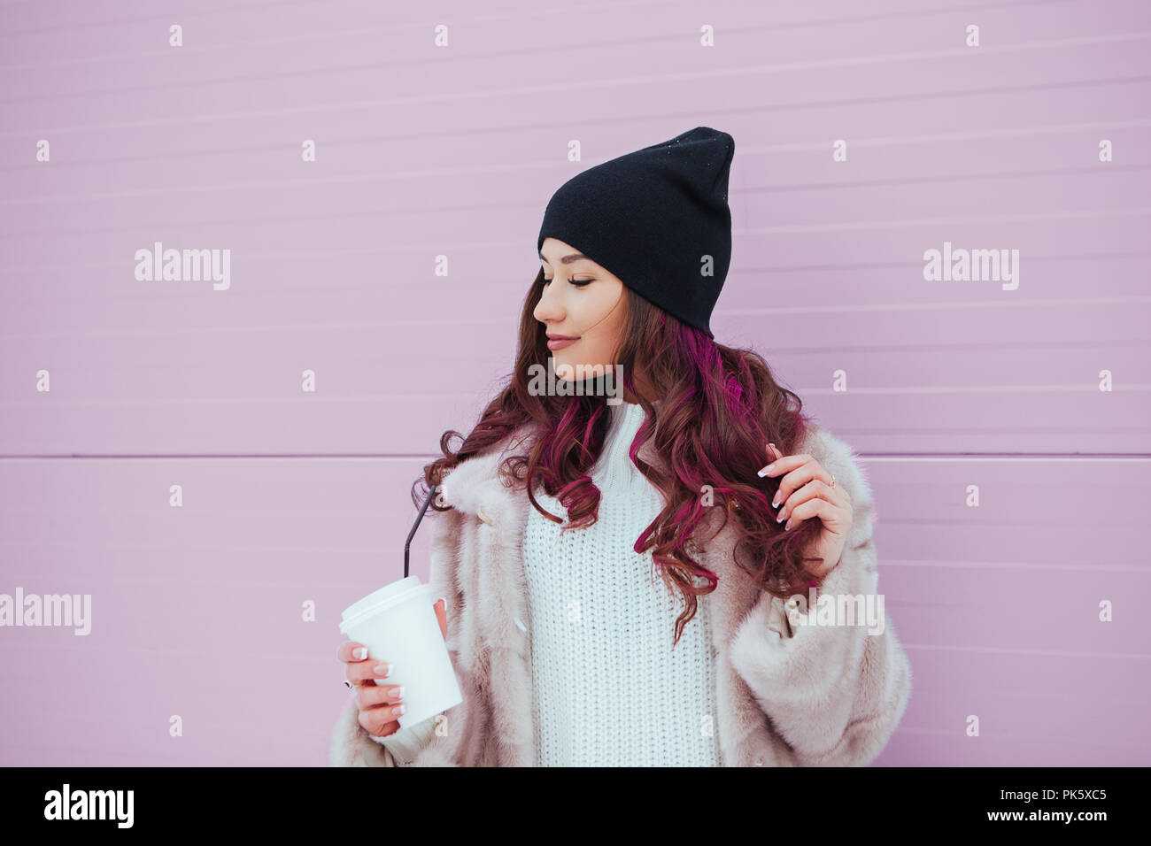 Portrait of beauty fashion smiling woman with coffee in mink coat and ...