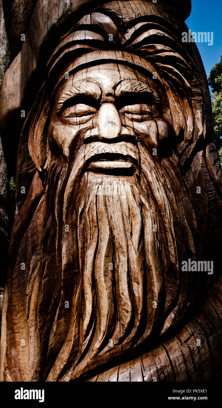 Carving tree face sculpture hi-res stock photography and images - Alamy