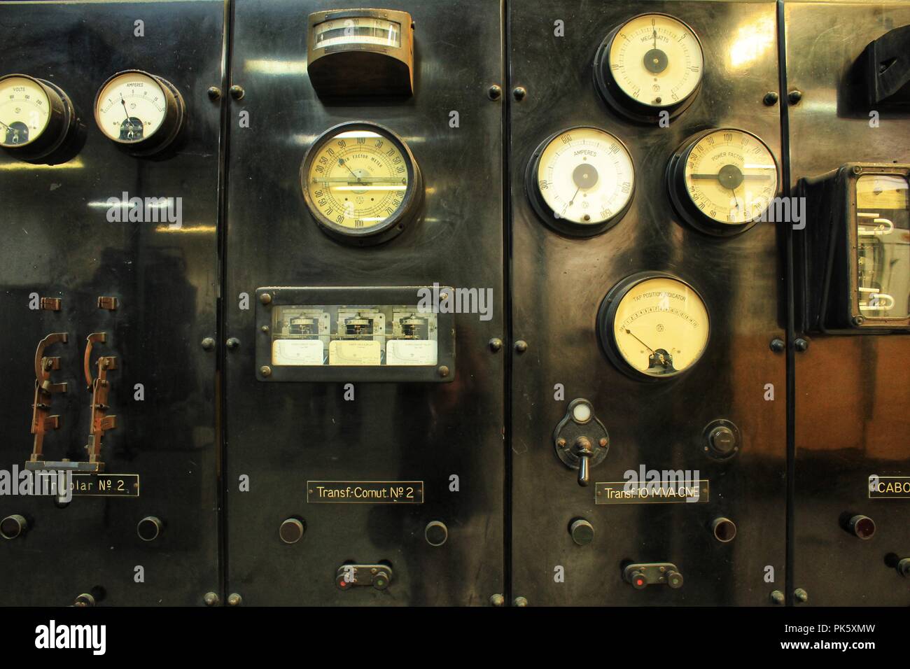 Old black vintage electrical transformers in a factory Stock Photo - Alamy