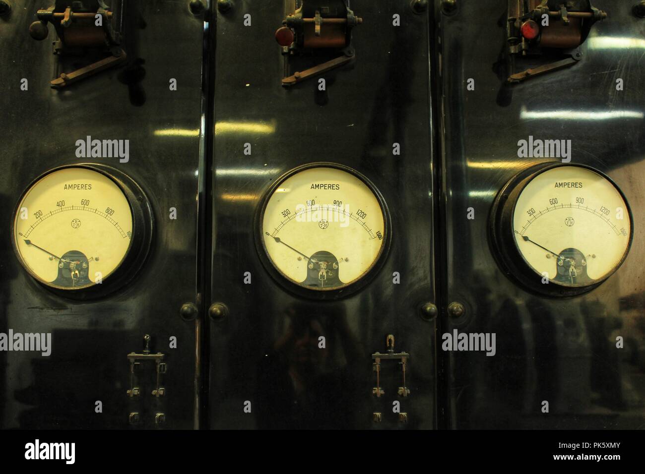 Old black vintage electrical transformers in a factory Stock Photo - Alamy