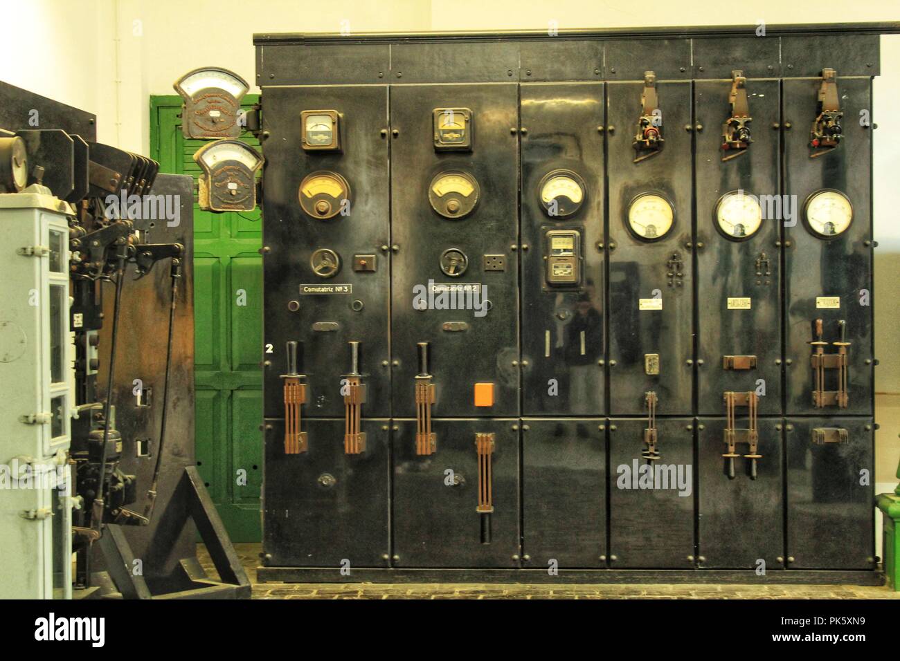 Old black vintage electrical transformers in a factory Stock Photo - Alamy
