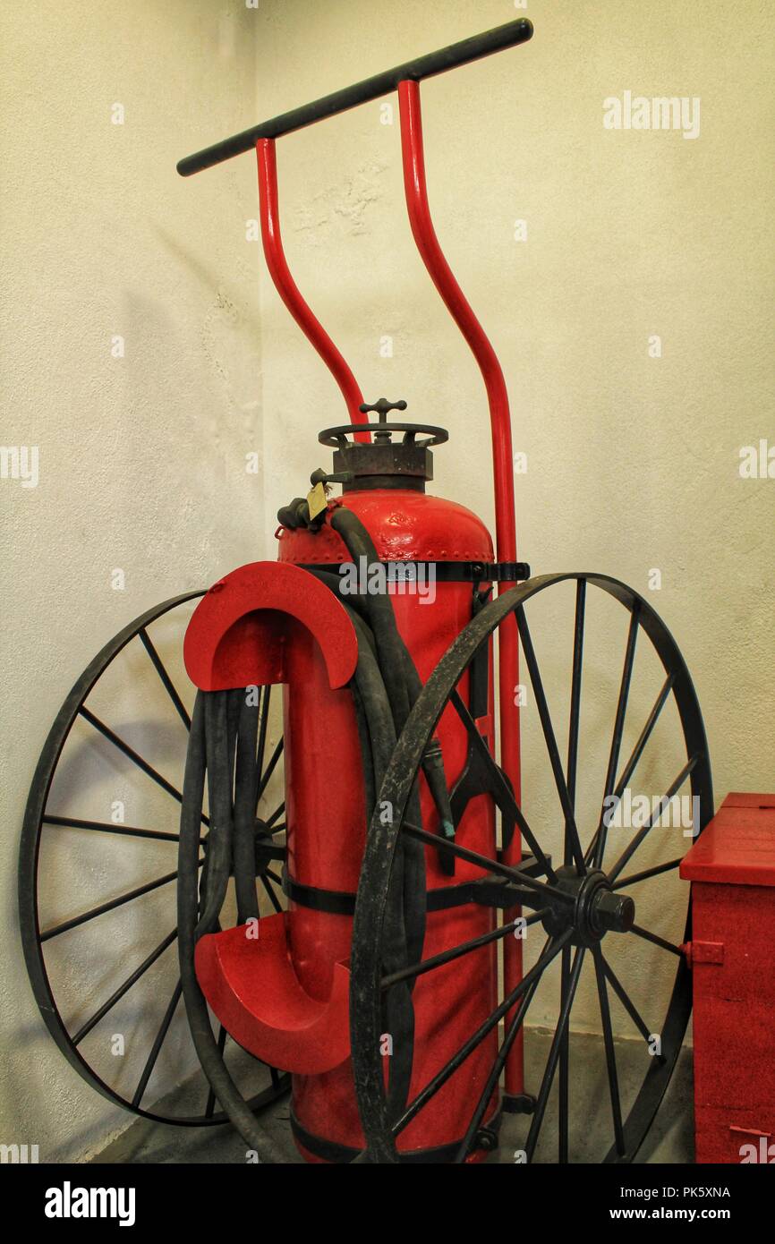 Old and vintage fire extinguishing system Stock Photo - Alamy