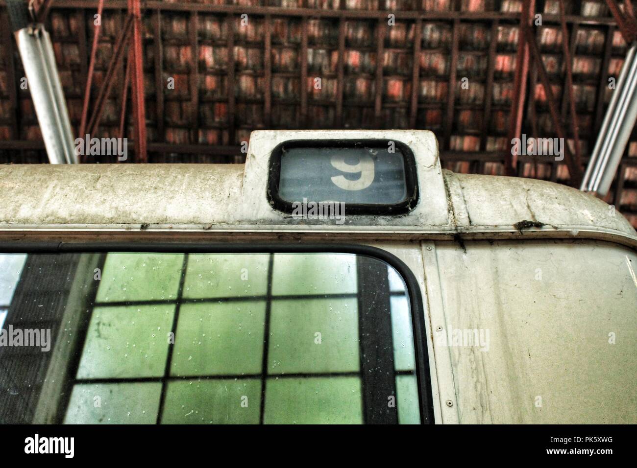 Texture and background of old school bus with number nine and tile ...