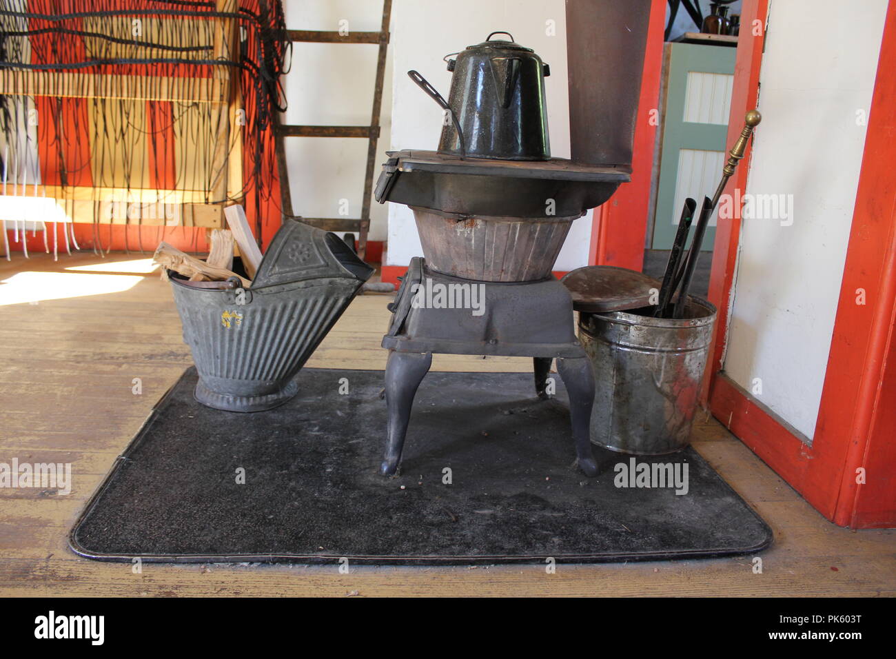 Iron heater at the currier leather makers cabin on a late summer day ...