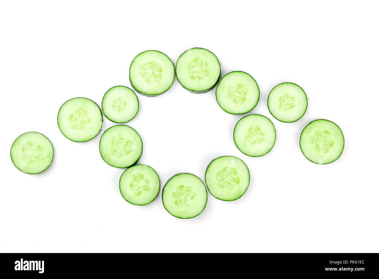 Cucumber slices in circle on white background with copyspace Stock ...