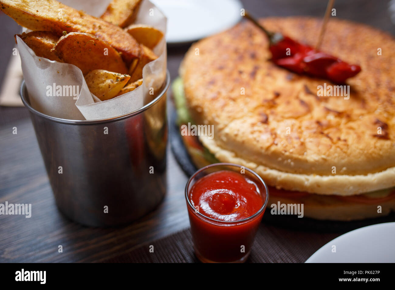 Burger and potato wedges hi-res stock photography and images - Alamy