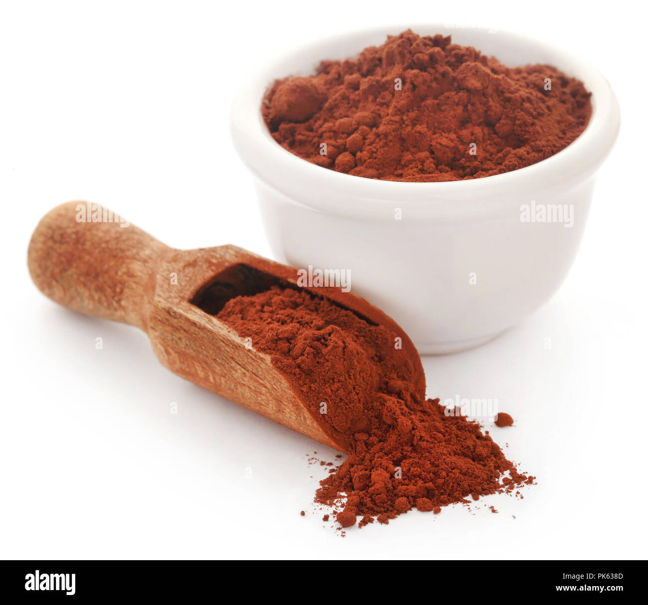 Cacao Powder in a bowl over white background Stock Photo - Alamy