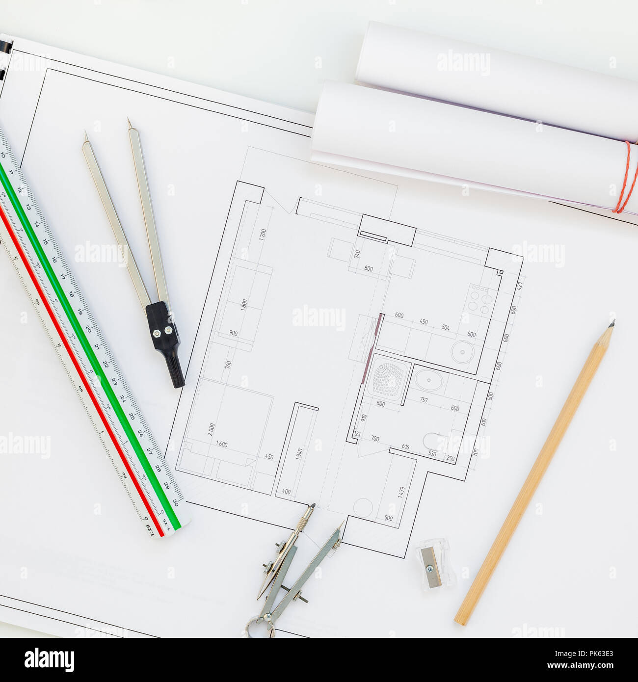 Creative flat lay overhead top view blueprints architectural flat ...