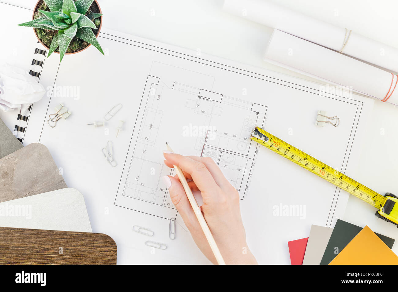 Creative flat lay overhead top view blueprints architectural flat ...