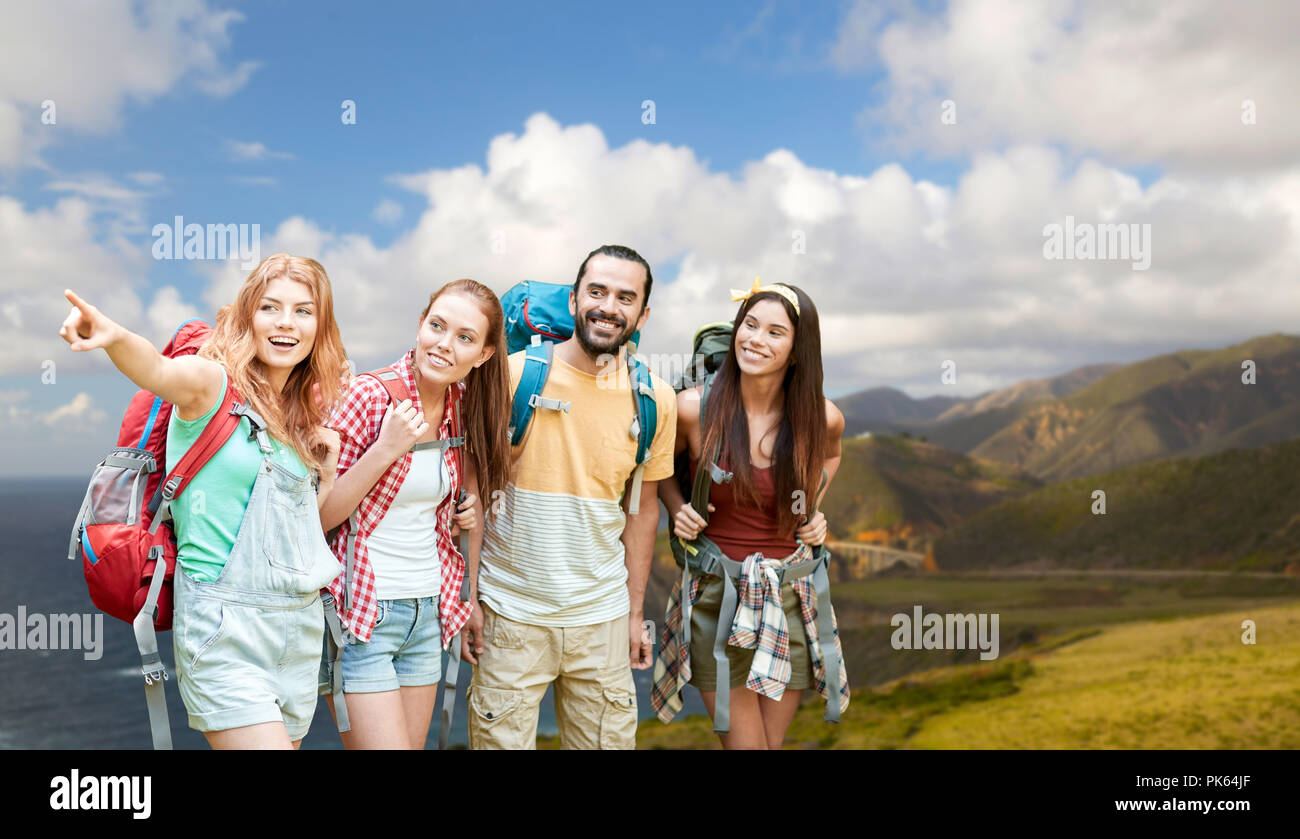 group of friends with backpacks on big sur coast Stock Photo - Alamy