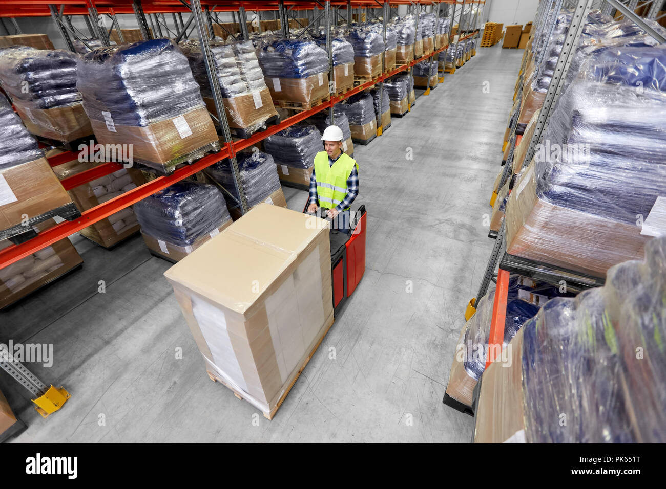loader operating forklift at warehouse Stock Photo - Alamy