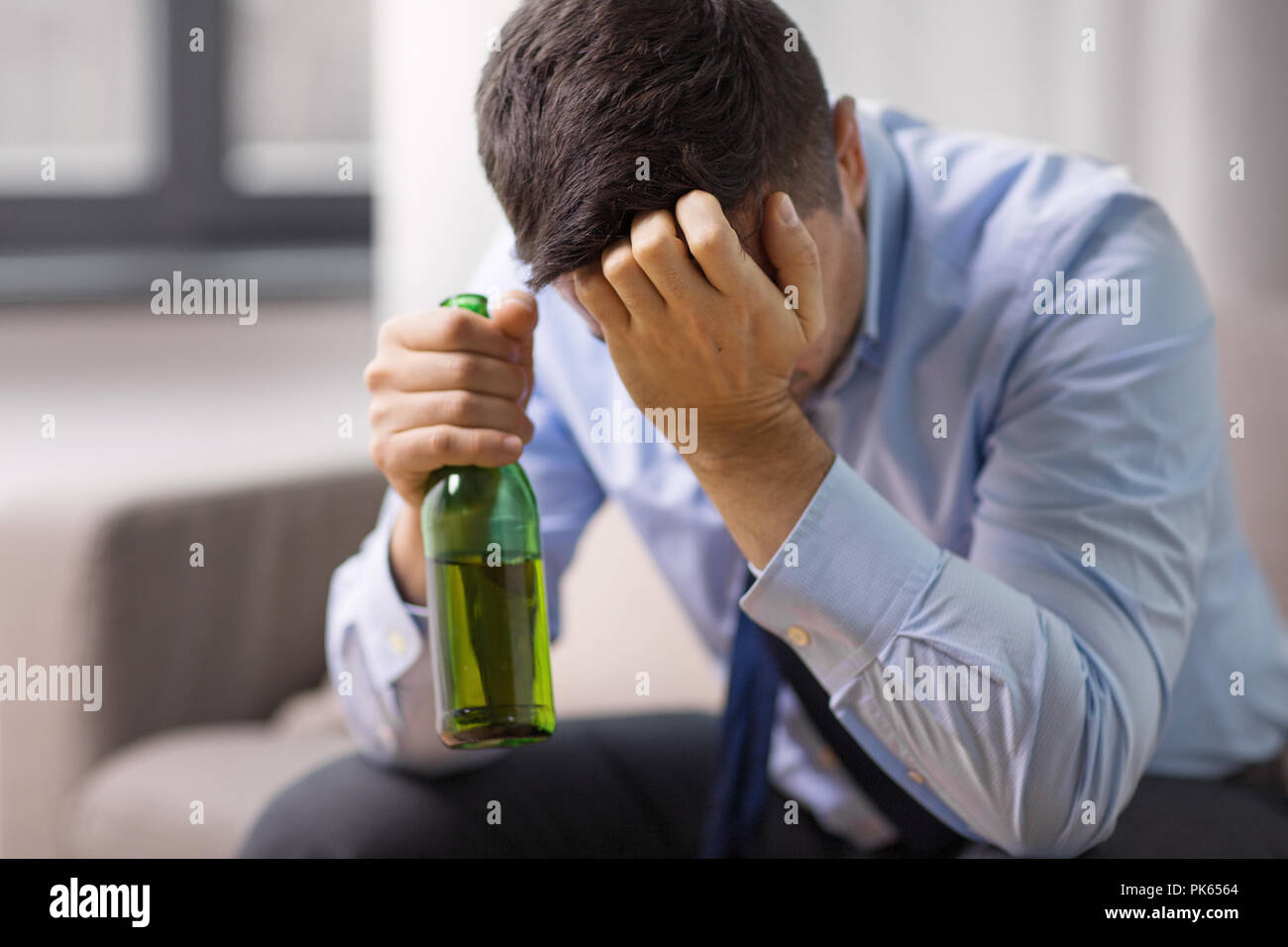 Middle aged drinking problem hi-res stock photography and images - Alamy