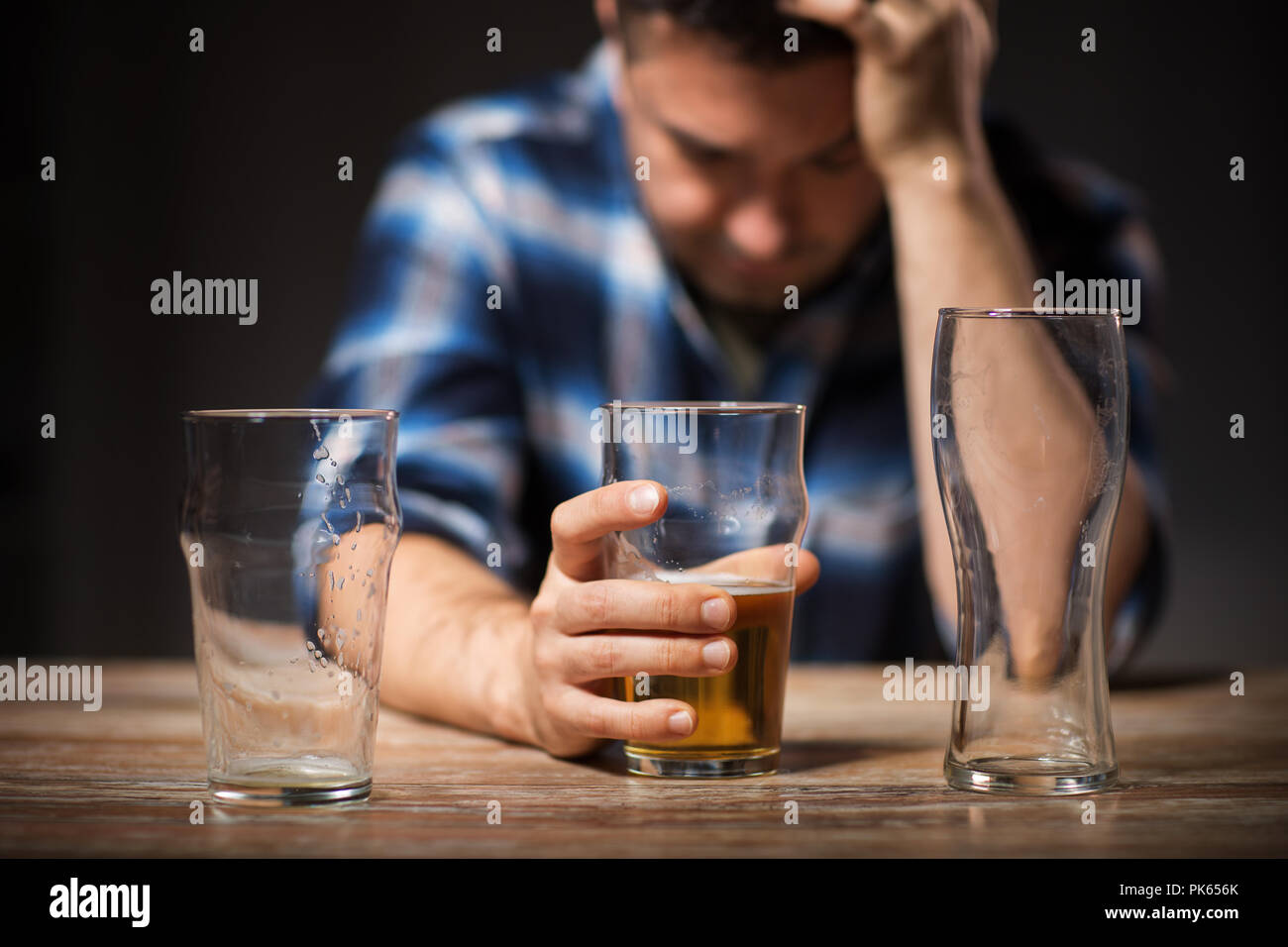 Drinking beer from glass hi-res stock photography and images - Alamy