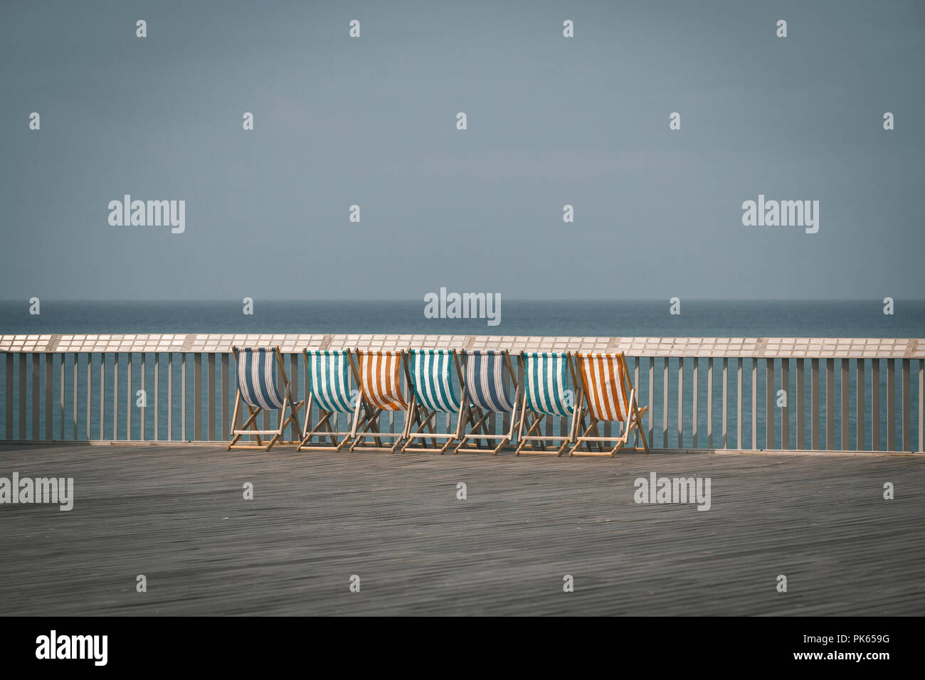 Empty deck chairs hi-res stock photography and images - Alamy