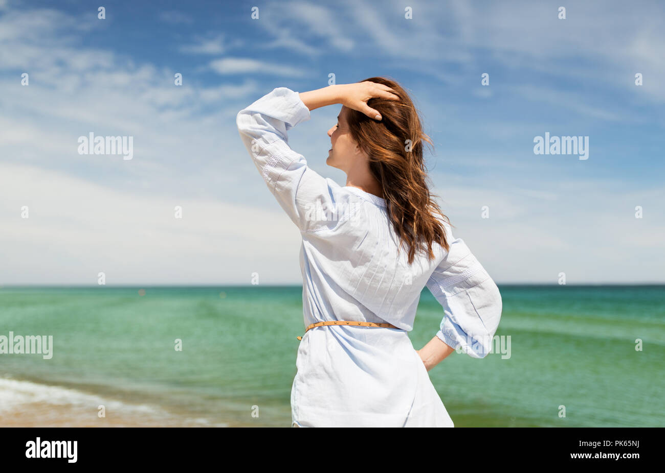 happy smiling woman on summer beach Stock Photo - Alamy