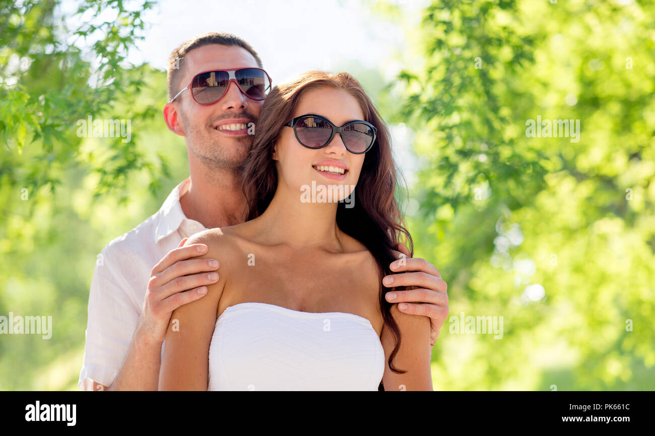 Romantic couple hugging over hi-res stock photography and images - Alamy