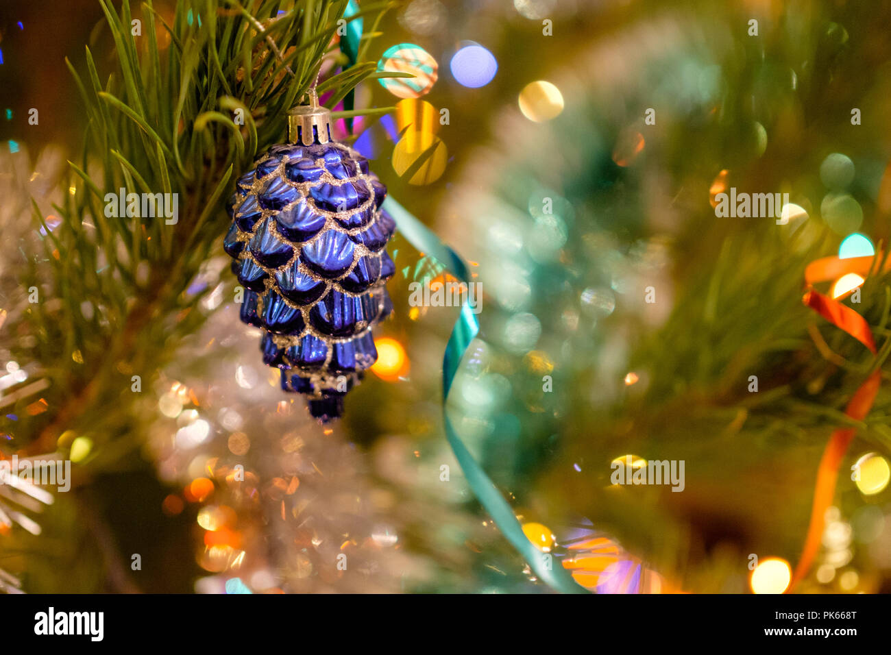 Christmas toys on the Christmas tree. New Year decoration. Serpentine ...