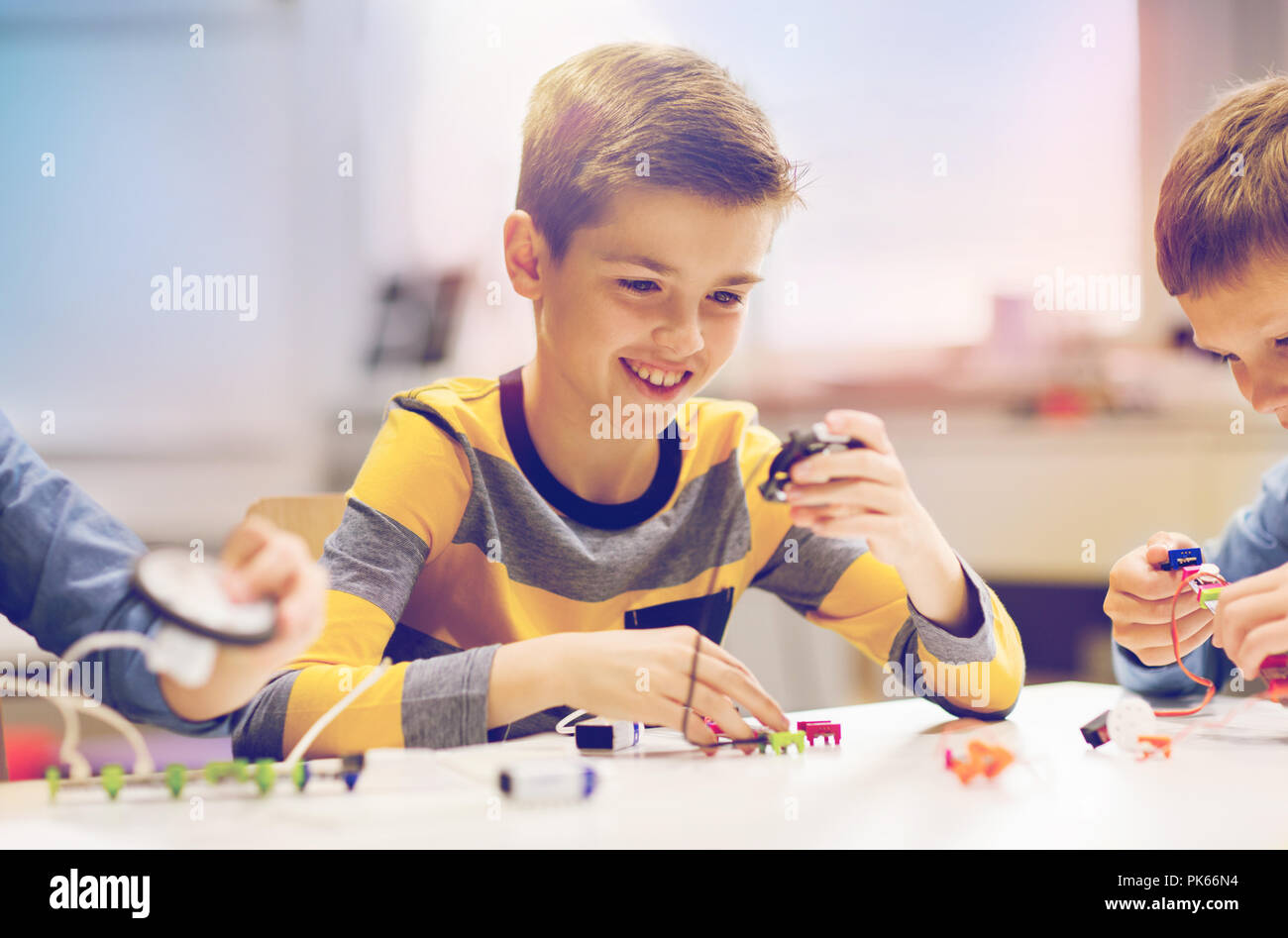 happy boy building robot at robotics school Stock Photo - Alamy happy boy building robot at robotics school Stock Photo - Alamy