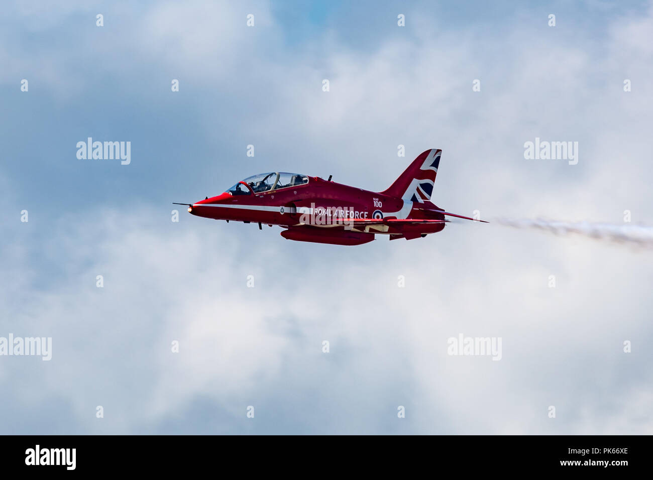 An RAF Red Arrows Hawk T1 training jet with RAF 100 markings Stock Photo - Alamy