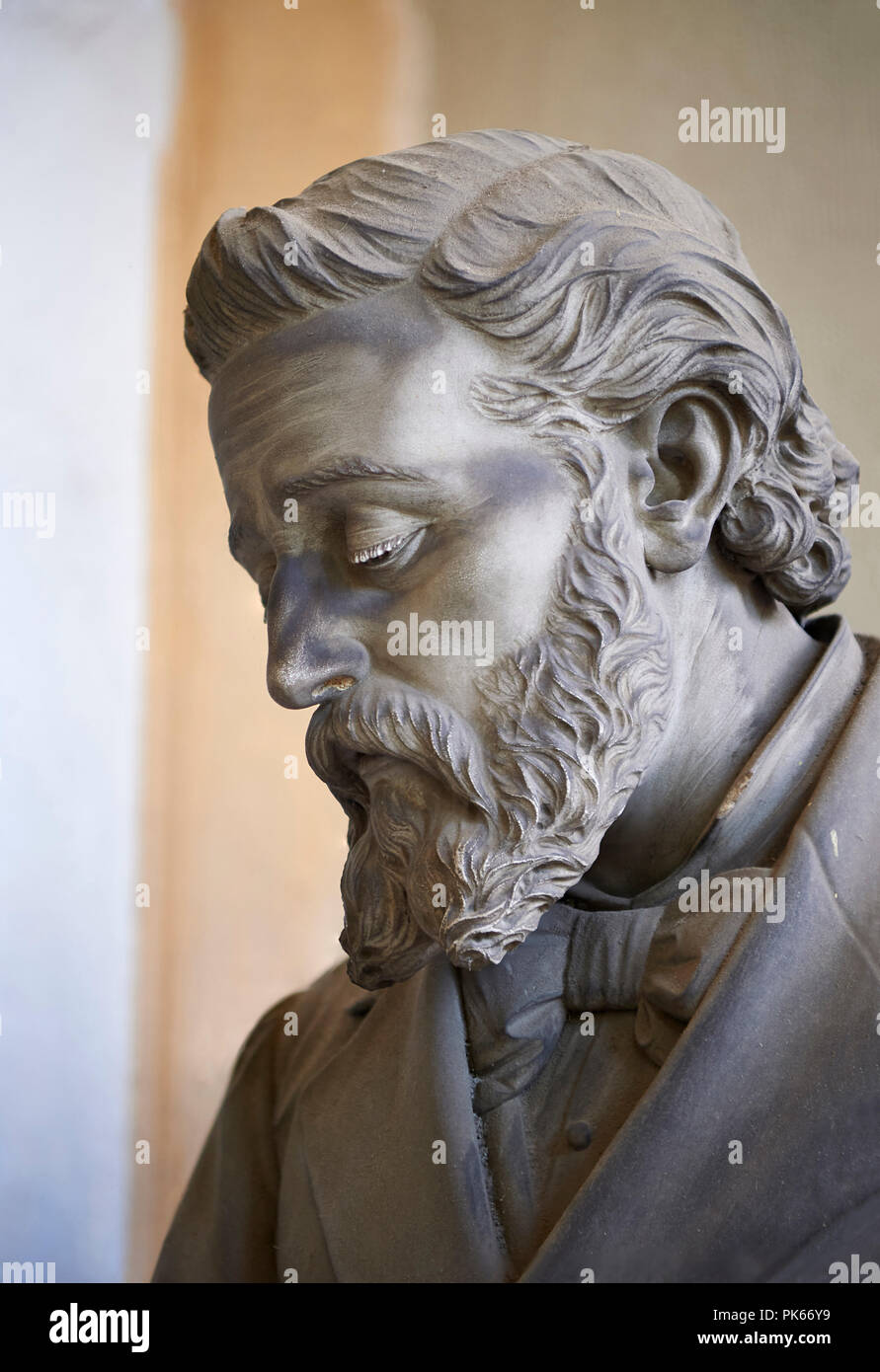 Picture and image of the stone sculpture of a mouring bearded man in ...