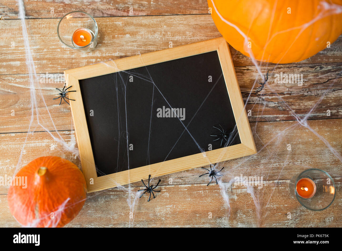 blank chalkboard and halloween decorations Stock Photo - Alamy