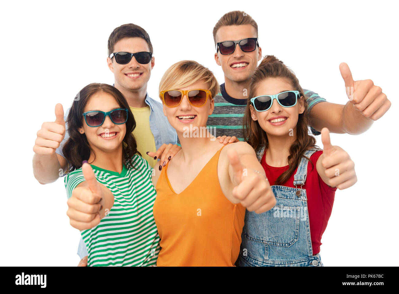 happy friends showing thumbs up Stock Photo - Alamy
