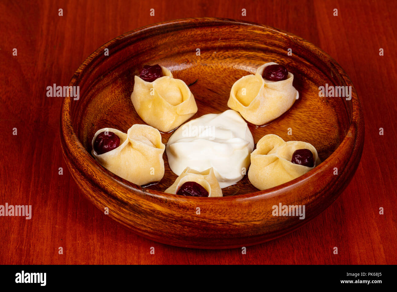 Uzbek traditional dumplings - Manti with meat Stock Photo - Alamy