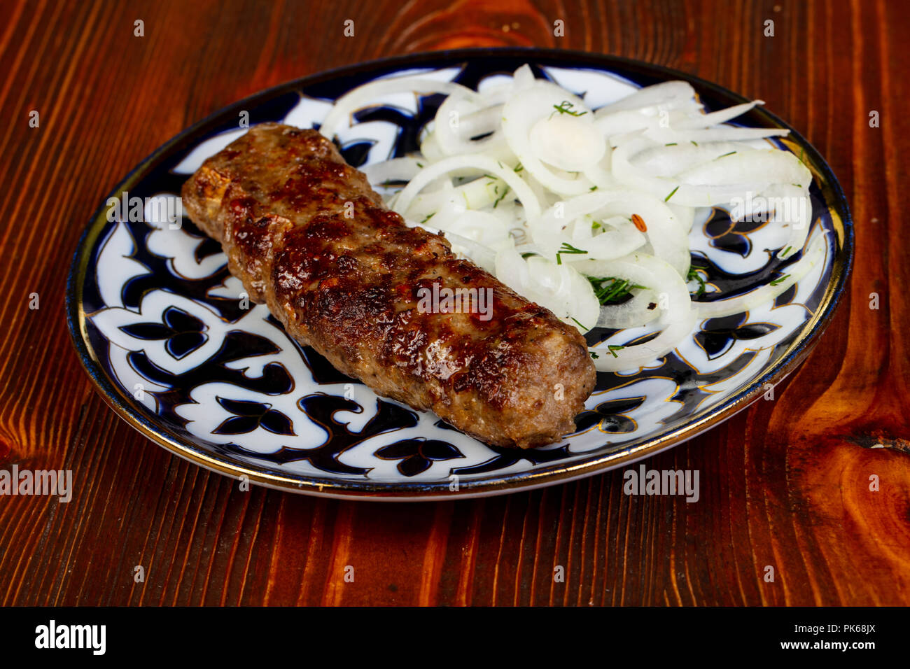 Minced Beef kebab with onion Stock Photo - Alamy