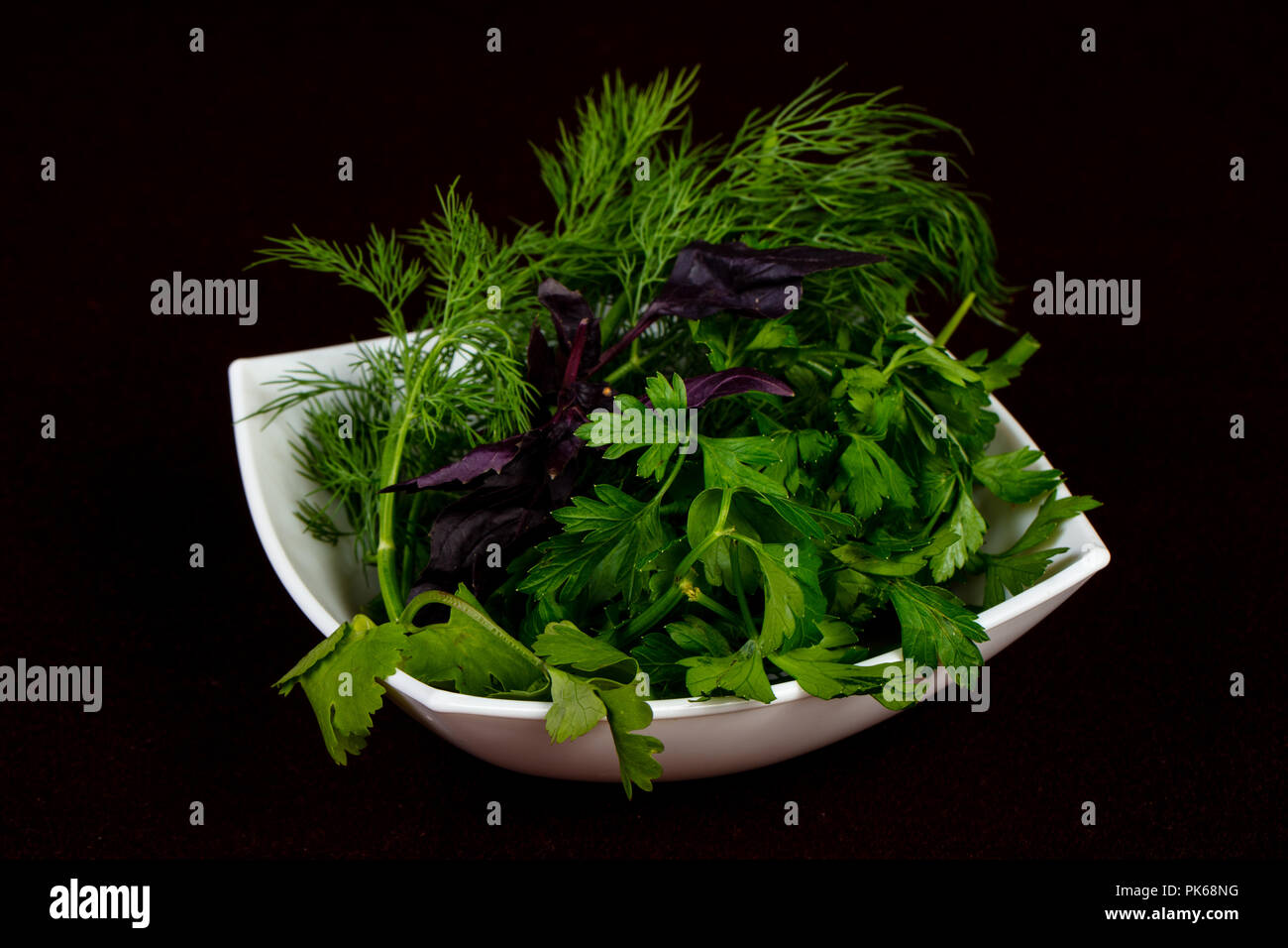 Herbs plate mix in the plate Stock Photo - Alamy