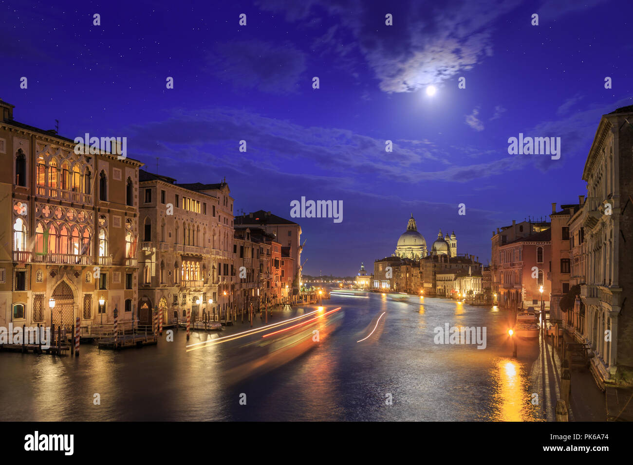 The moon shines over Venice. Picture taken from the Academy bridge ...
