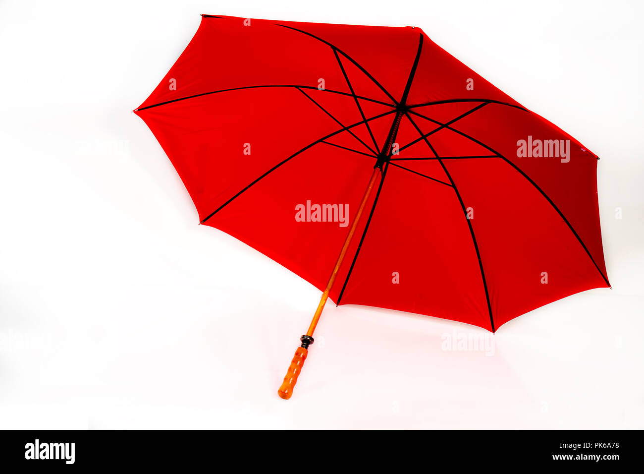 Large Red Umbrella opened up. White and Black backgrounds, Some with ...