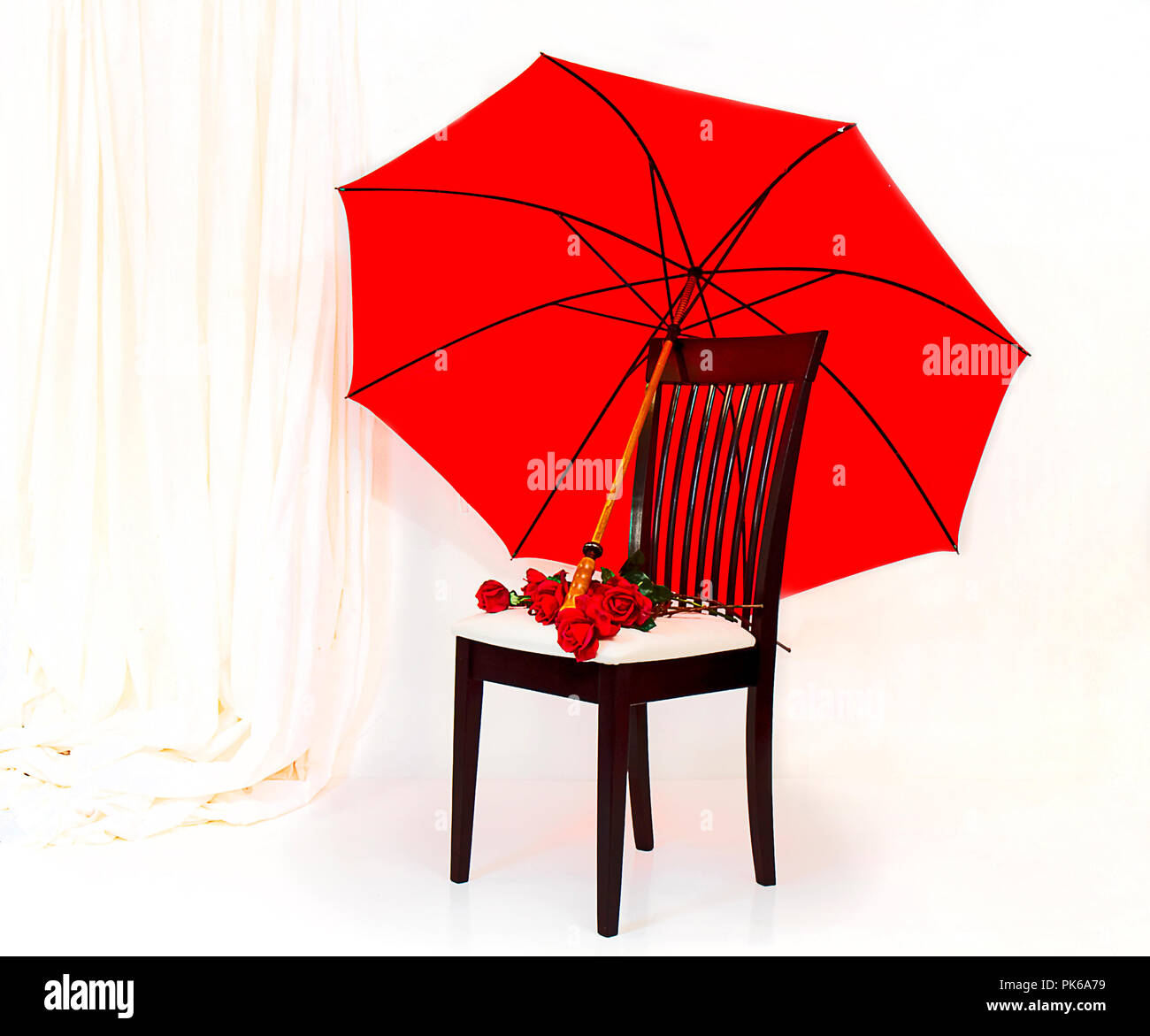 Large Red Umbrella opened up. White and Black backgrounds, Some with ...