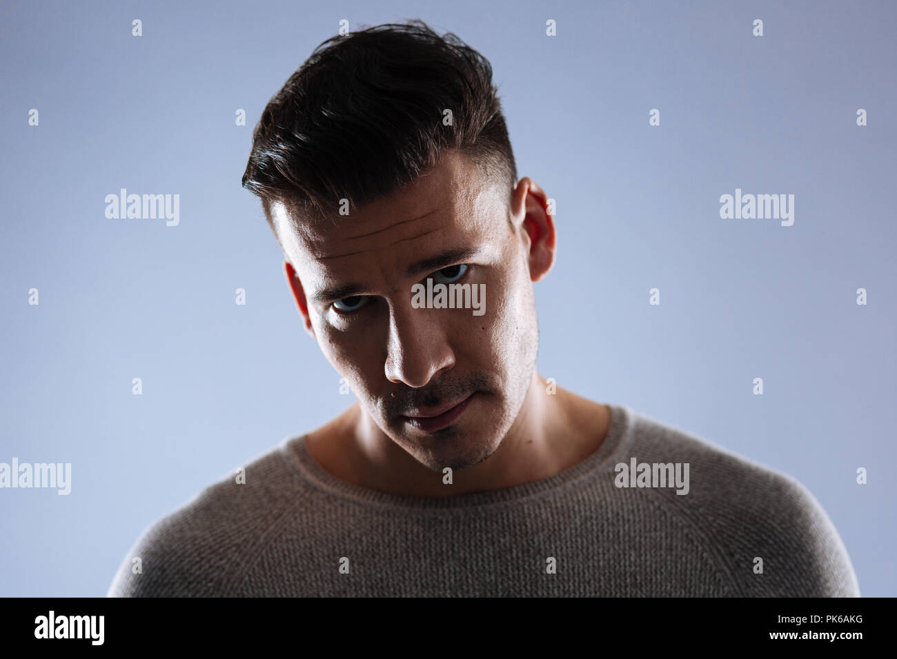 Portrait of a smart handsome man in the shadow Stock Photo - Alamy