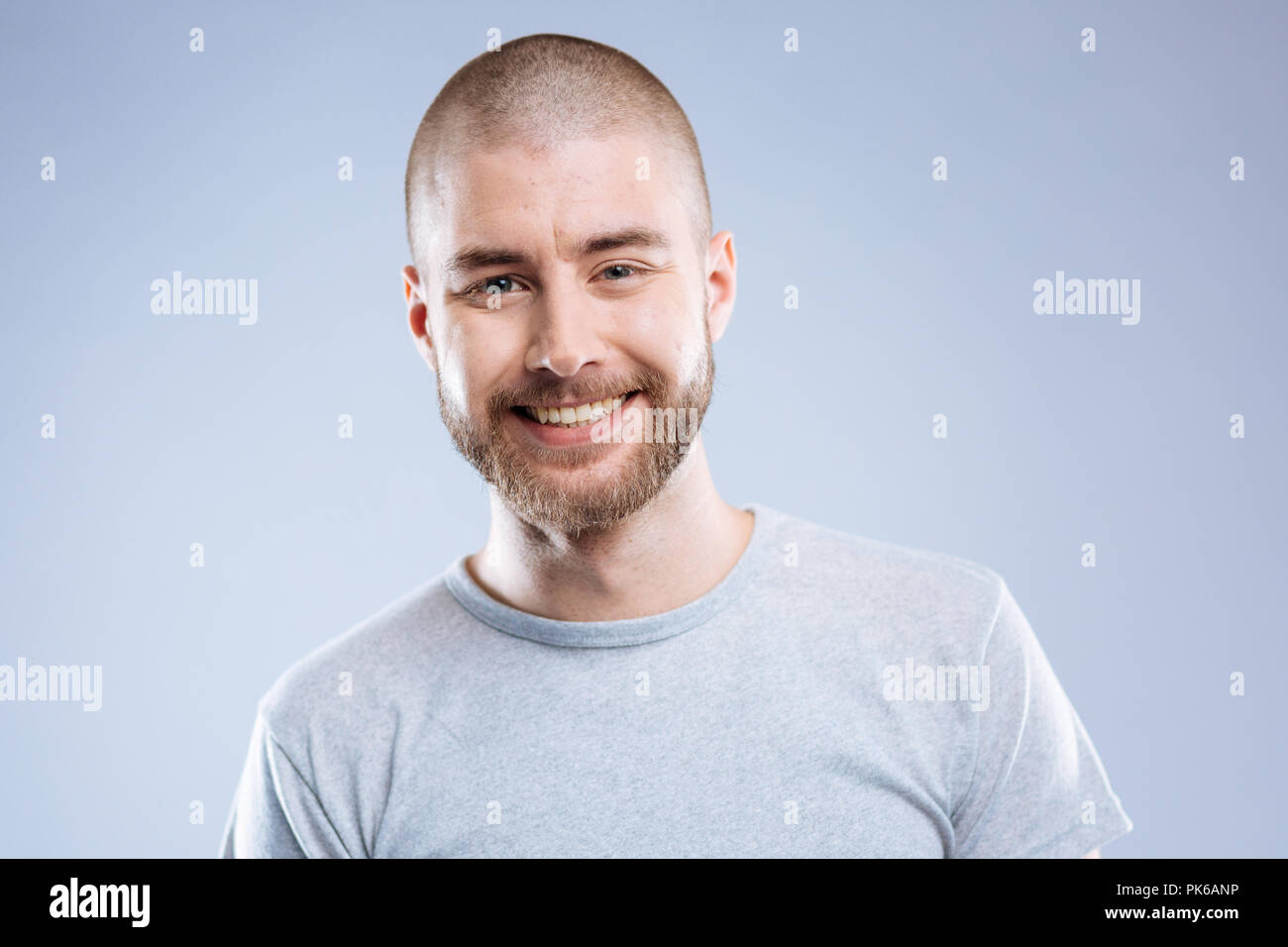 Positive cheerful man being in a great mood Stock Photo - Alamy