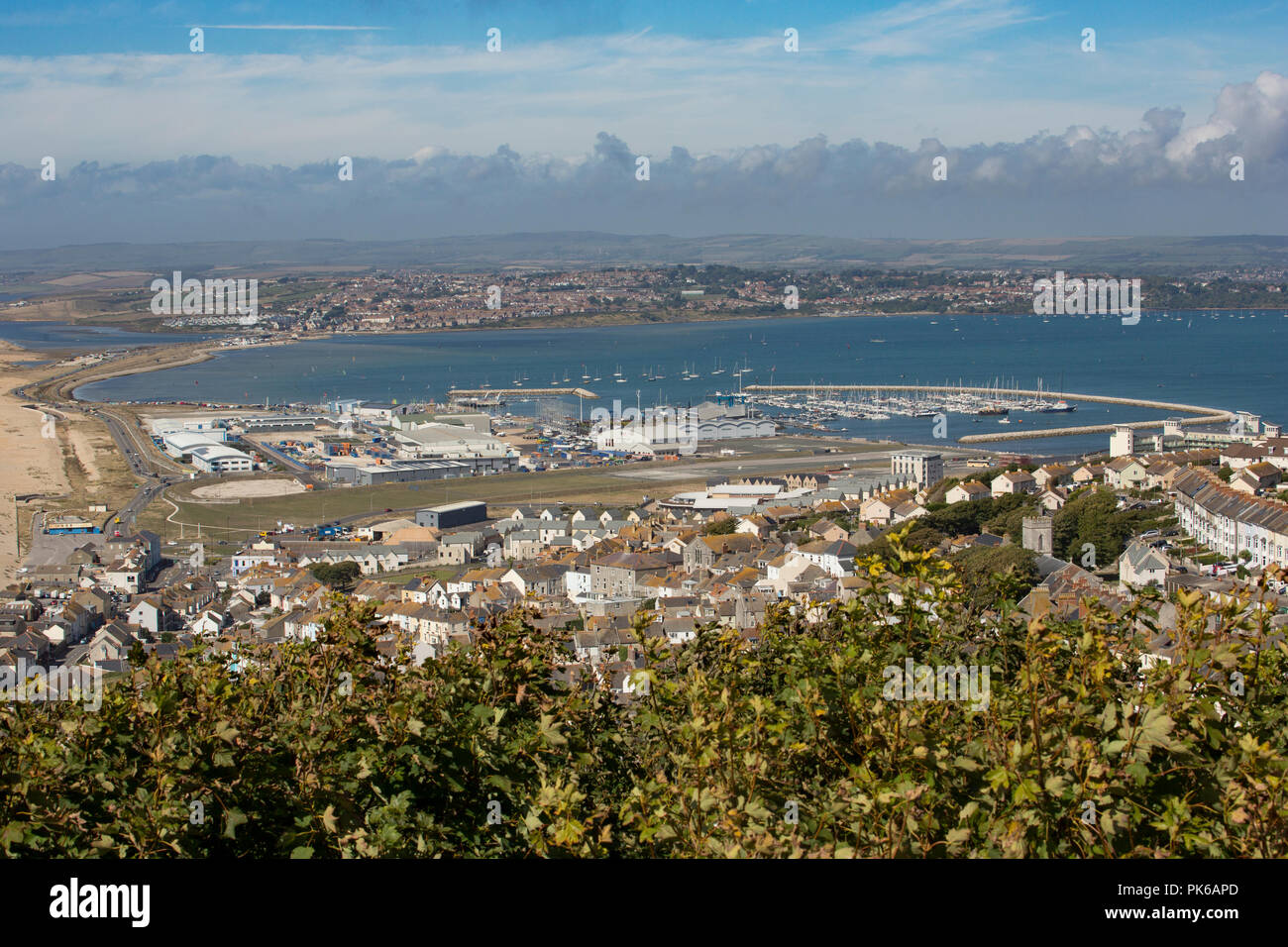 A view of Portland Harbour from the Isle of Portland Dorset England UK ...