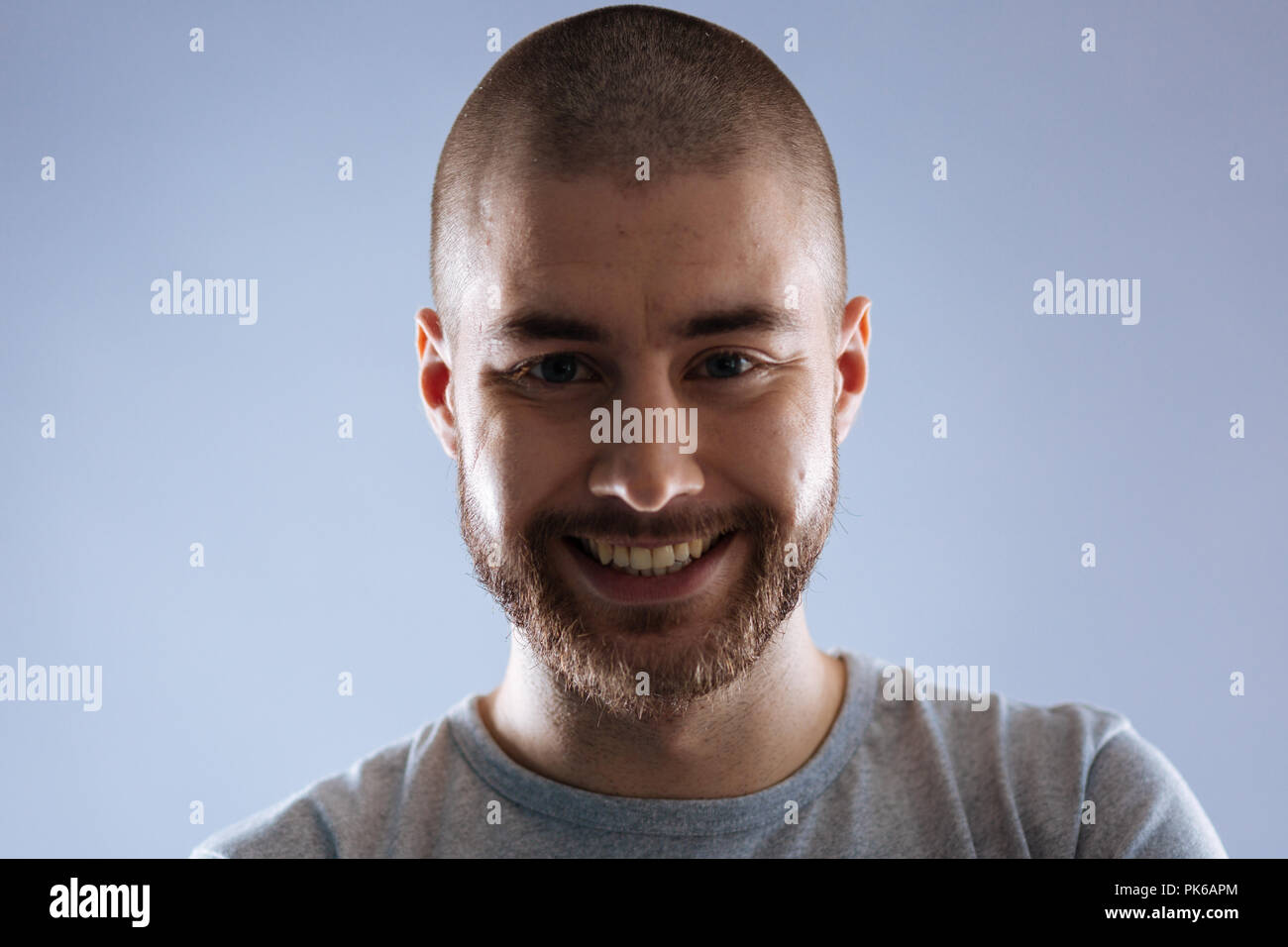 Joyful positive man expressing his pleasant emotions Stock Photo - Alamy Joyful positive man expressing his pleasant emotions Stock Photo - Alamy