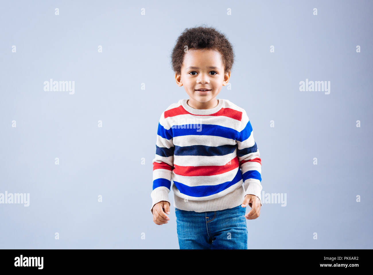 Cute happy nice boy smiling to you Stock Photo - Alamy