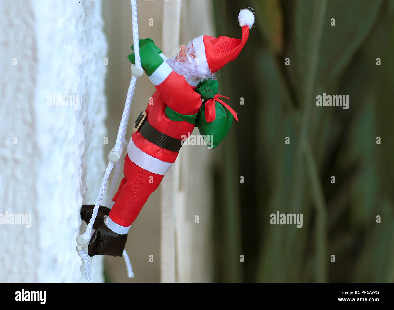 Santa climbing the chimney hi-res stock photography and images - Alamy