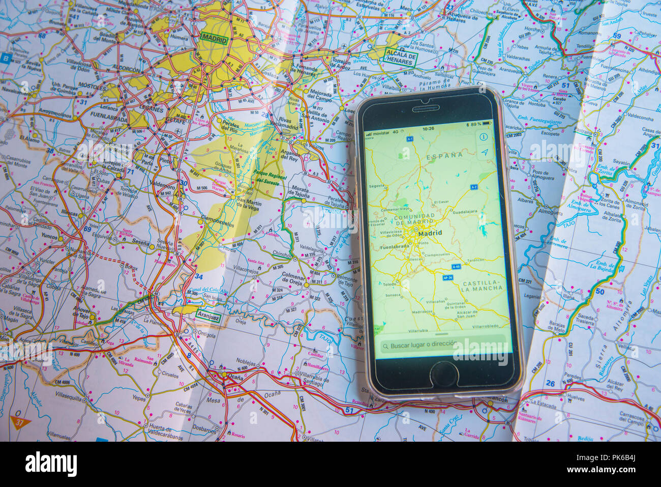 Mobile phone on road map Stock Photo - Alamy