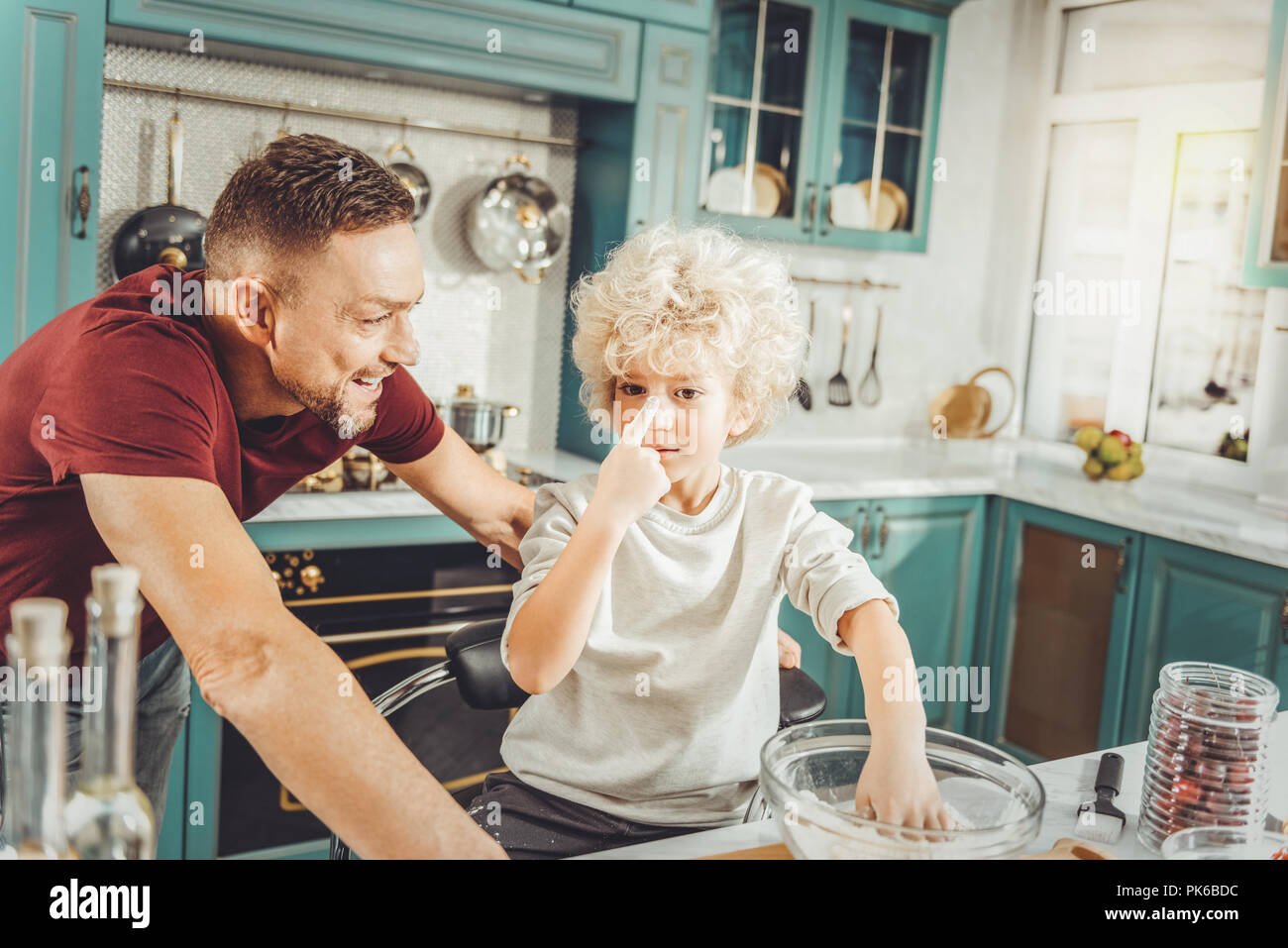 Bearded father cooking with children hi-res stock photography and ...