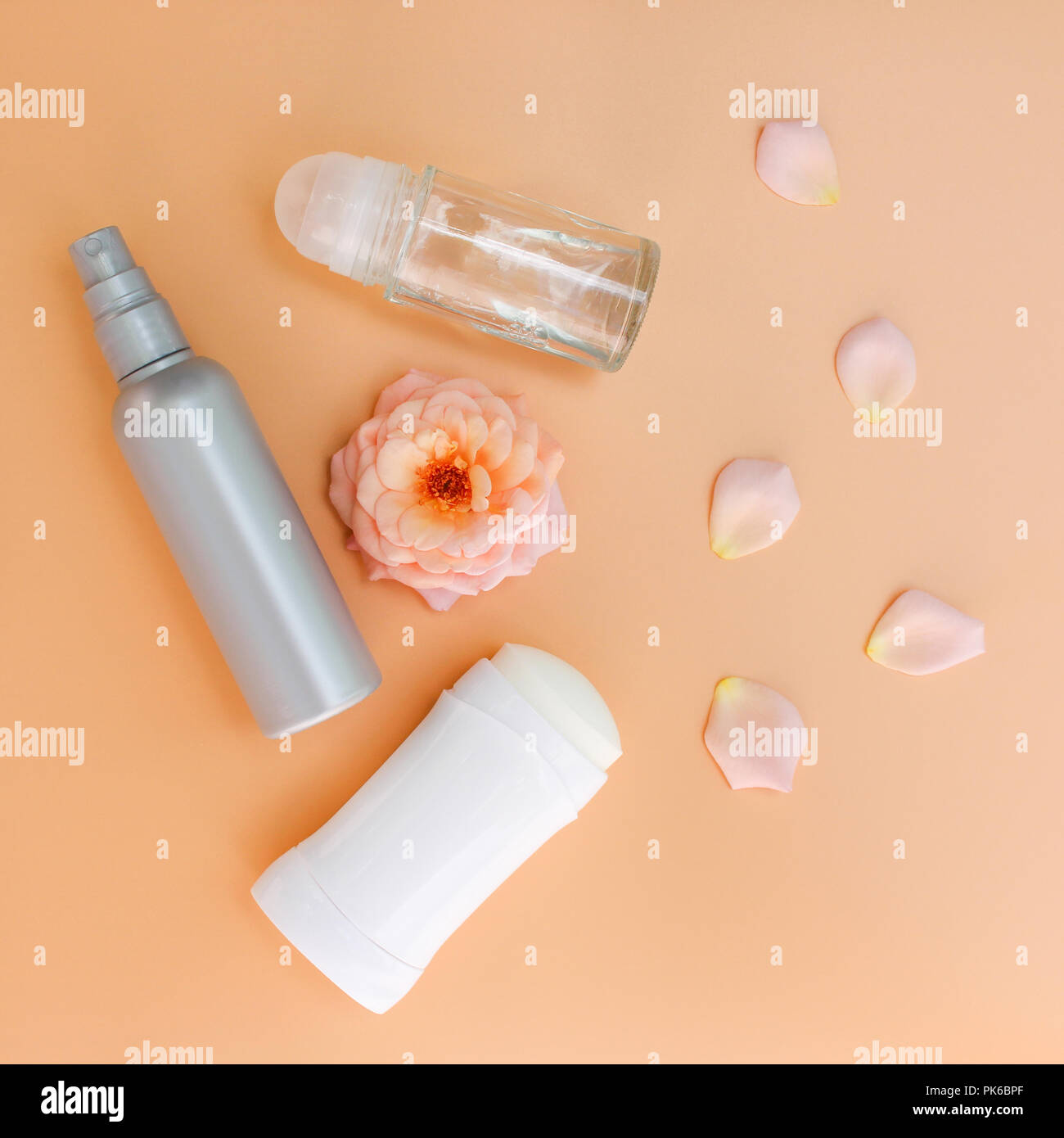 Different deodorants on beige background. Top view Stock Photo - Alamy